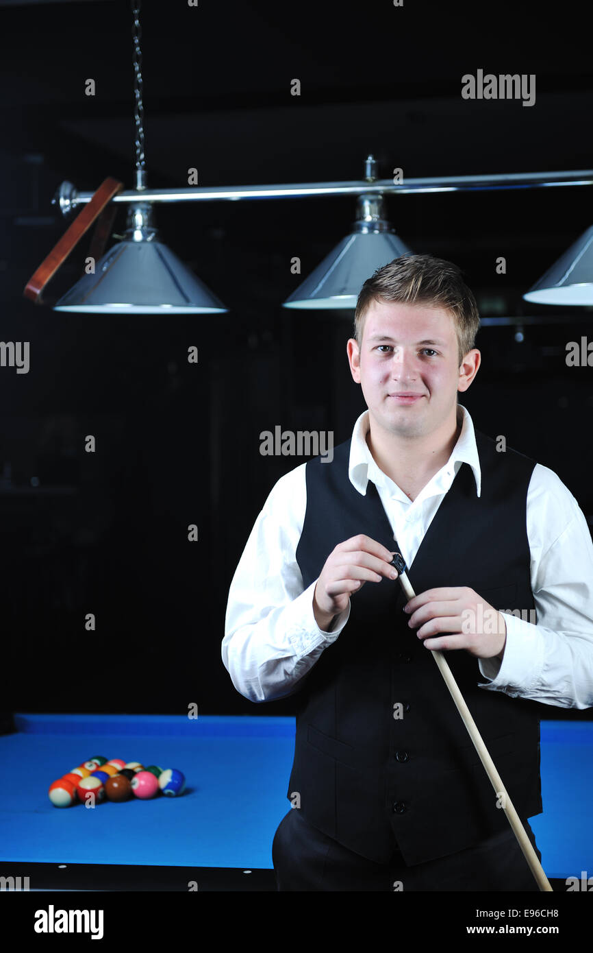 young man play pro billiard game Stock Photo - Alamy