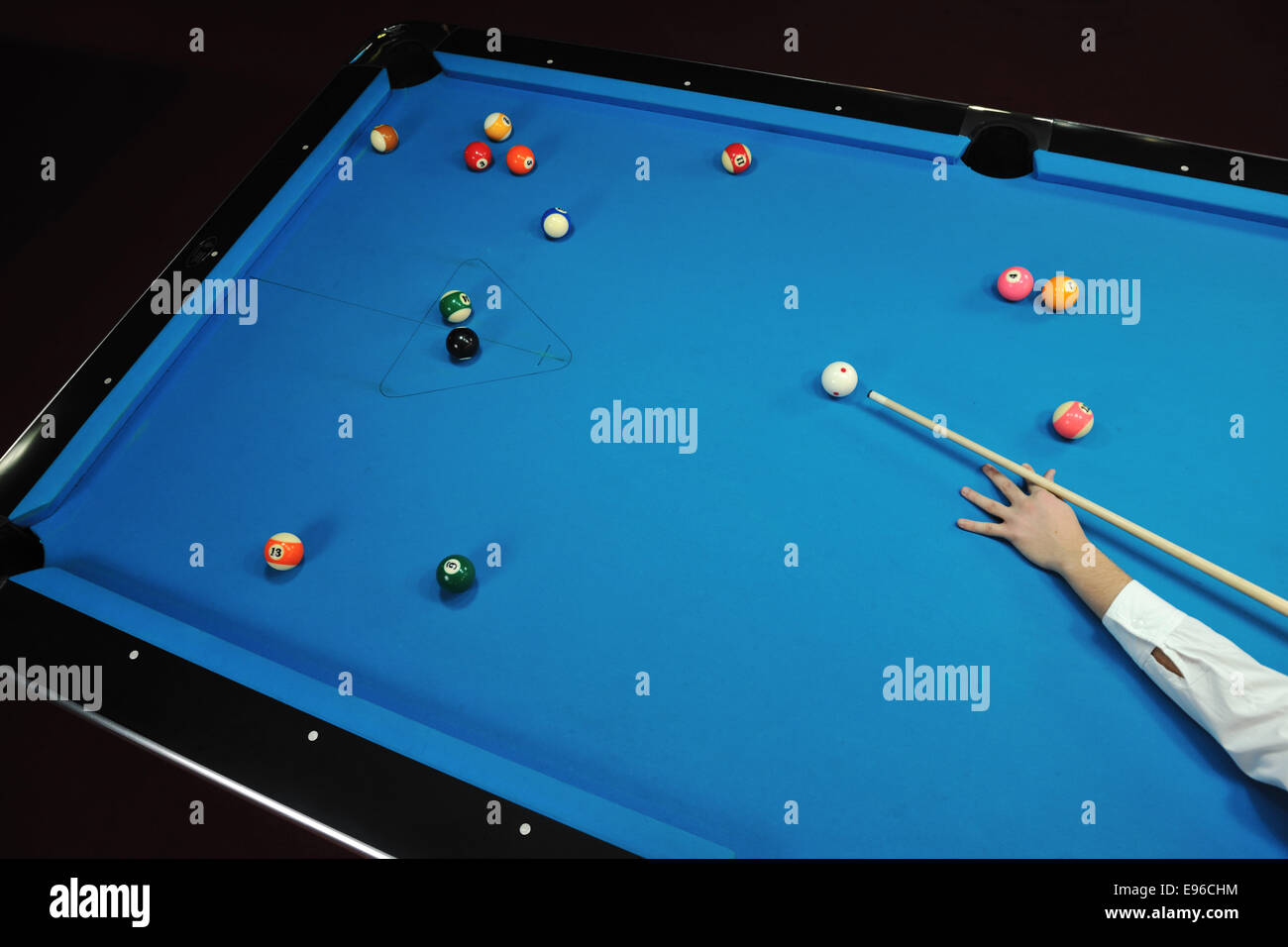 young man play pro billiard game Stock Photo - Alamy