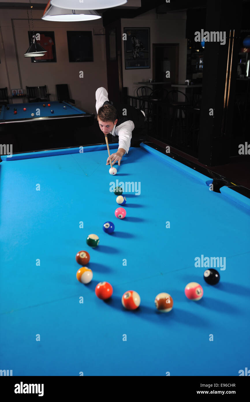 young man play pro billiard game Stock Photo - Alamy