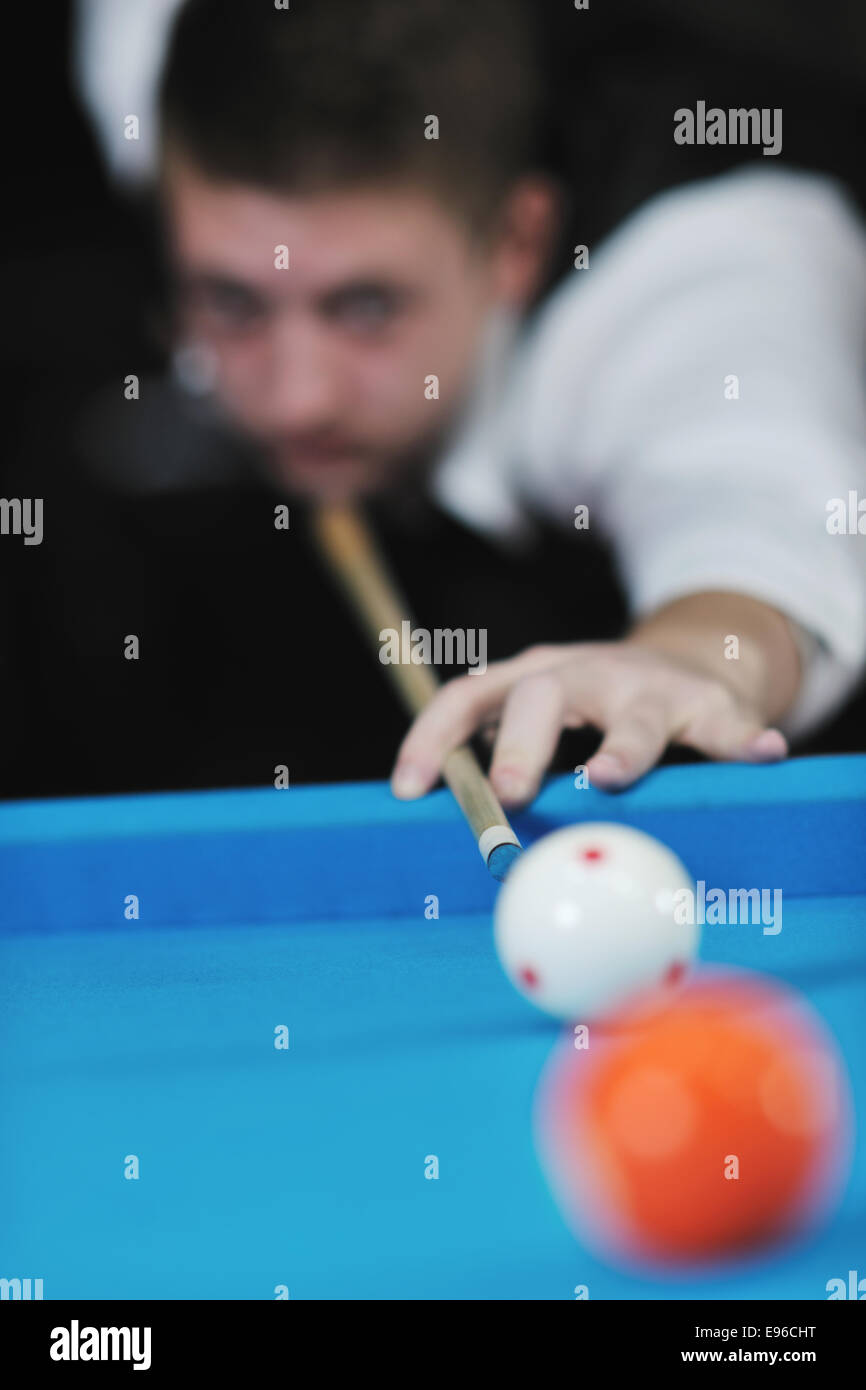 young man play pro billiard game Stock Photo - Alamy