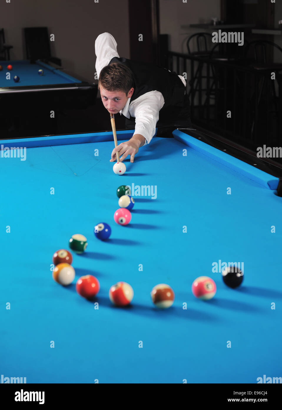 young man play pro billiard game Stock Photo - Alamy