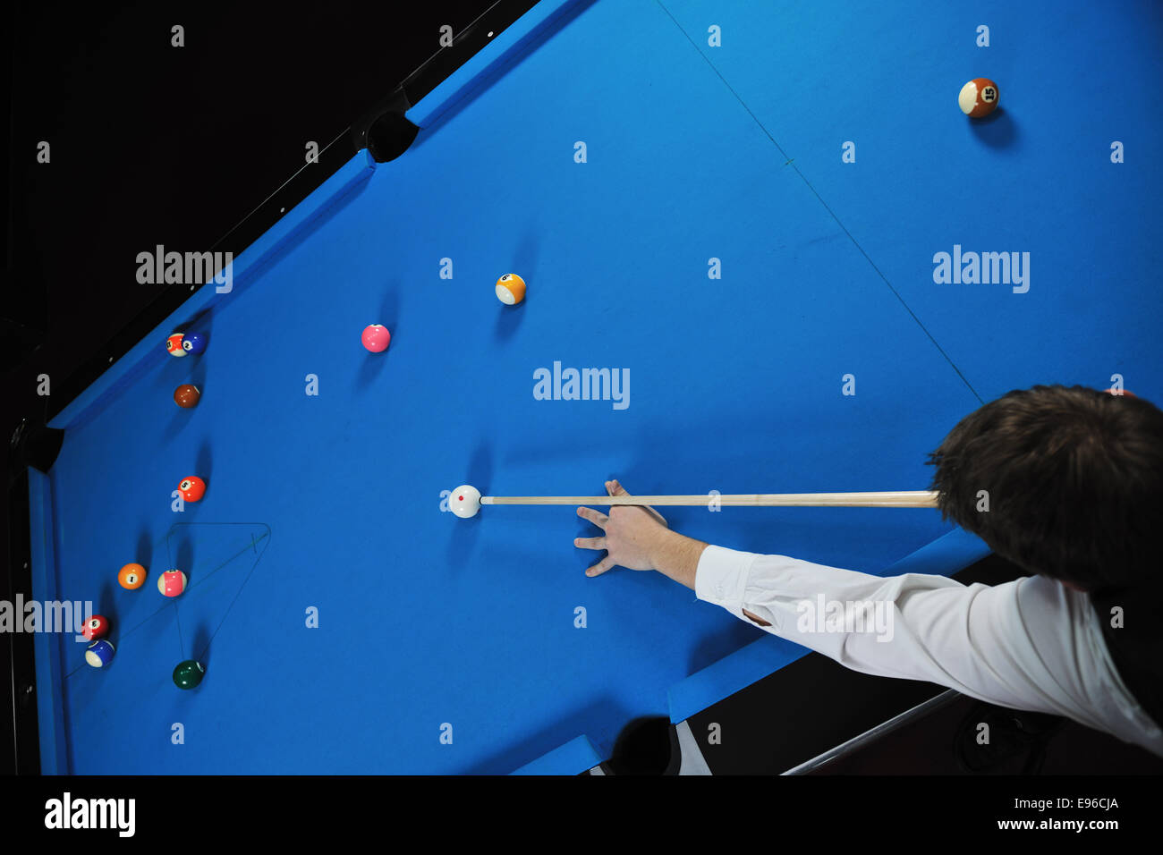 young man play pro billiard game Stock Photo - Alamy