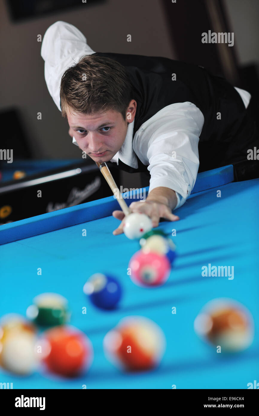 young man play pro billiard game Stock Photo - Alamy