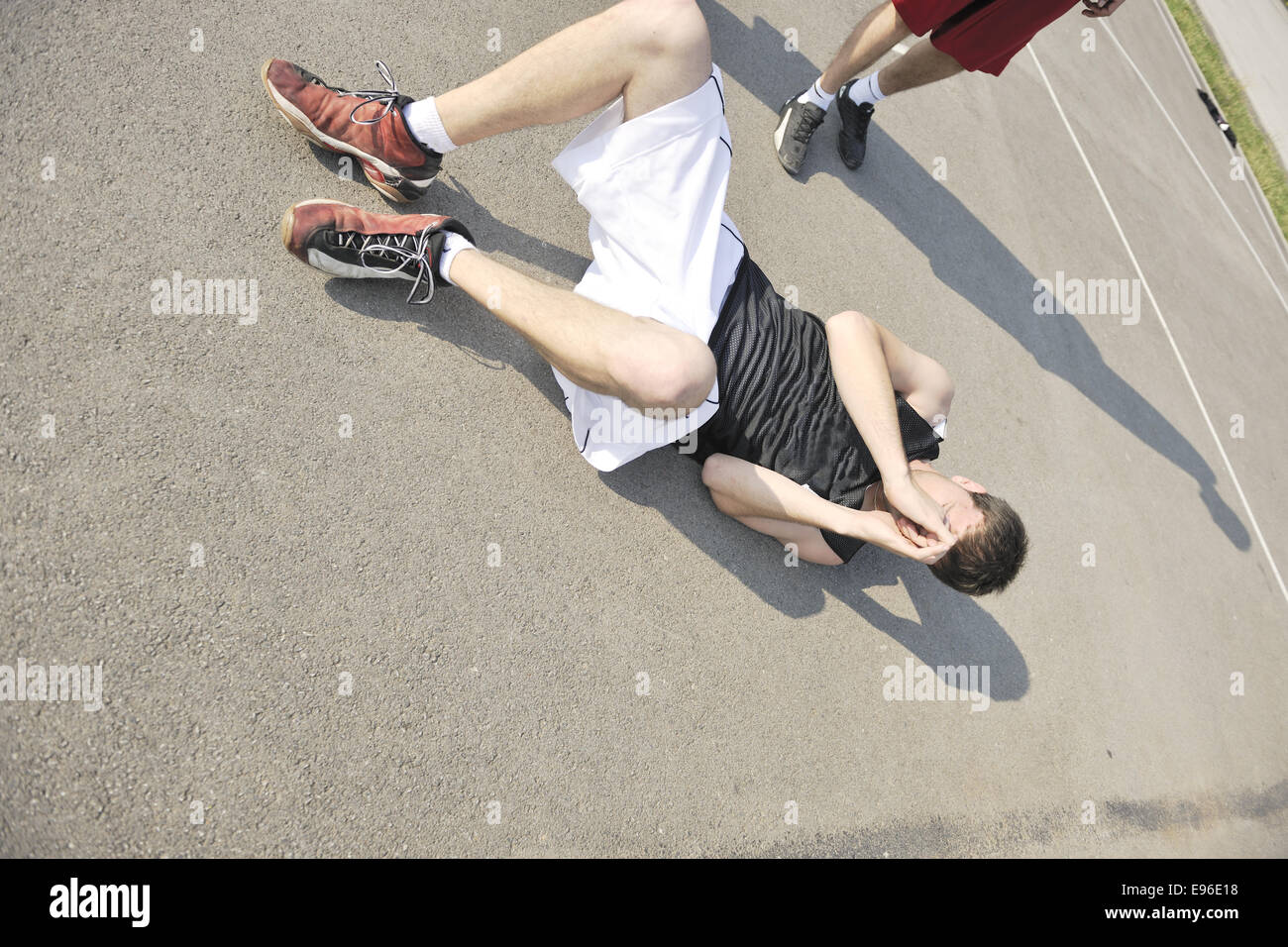 basketball sport trauma injury Stock Photo - Alamy