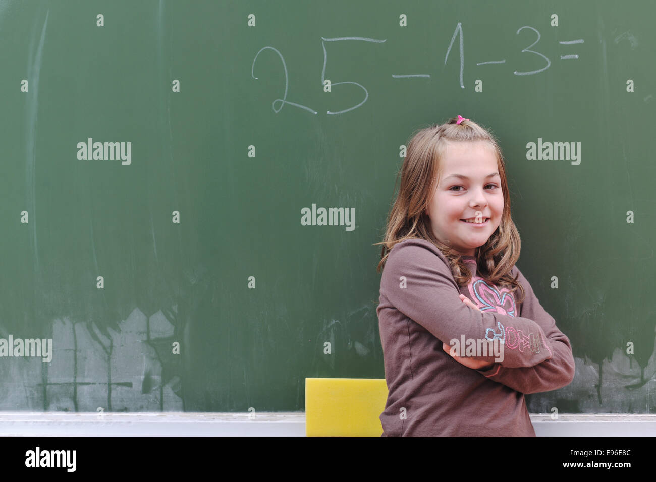 happy school girl on math classes Stock Photo - Alamy
