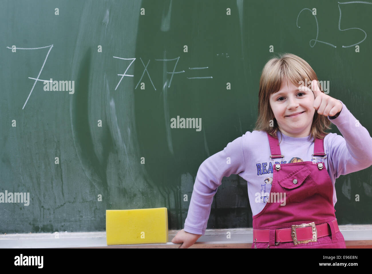 happy school girl on math classes Stock Photo - Alamy
