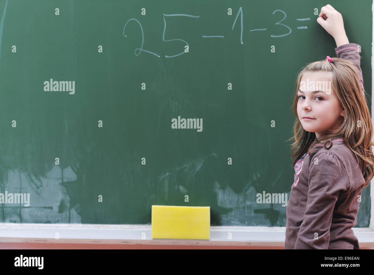 happy school girl on math classes Stock Photo - Alamy