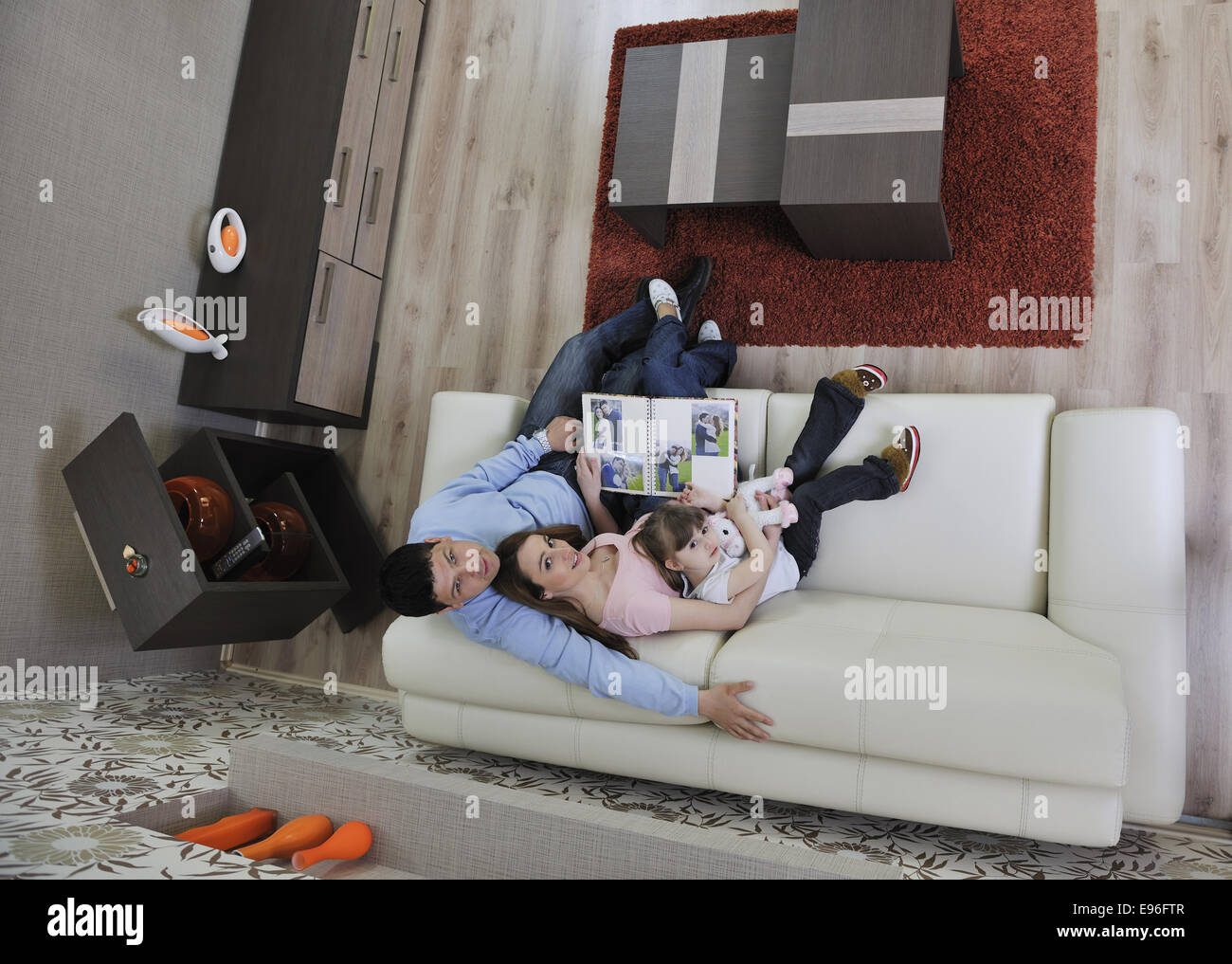 happy family looking photos at home Stock Photo - Alamy
