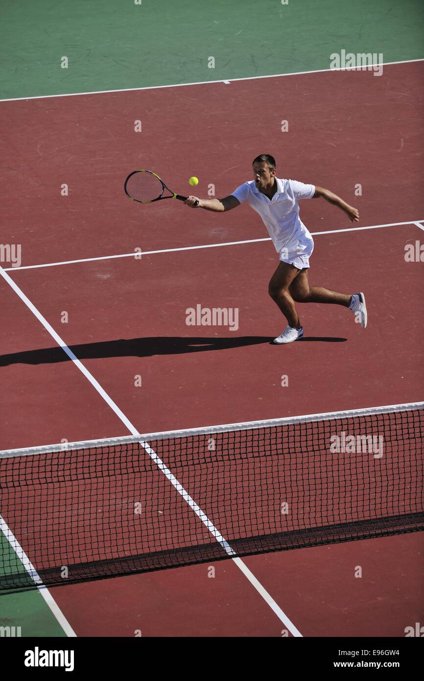 young man play tennis outdoor Stock Photo - Alamy