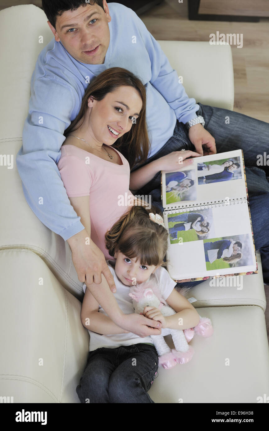 happy family looking photos at home Stock Photo - Alamy