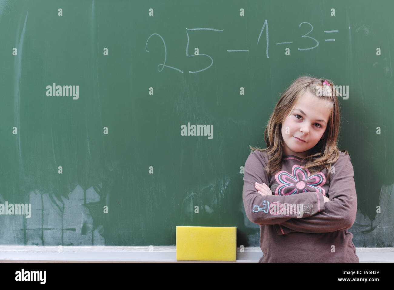 happy school girl on math classes Stock Photo - Alamy