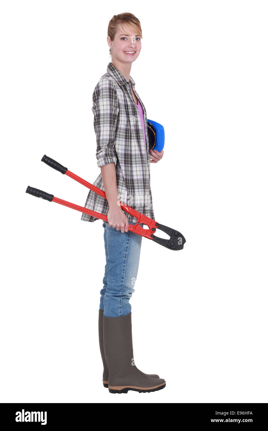 Woman carrying bolt cutters Stock Photo - Alamy