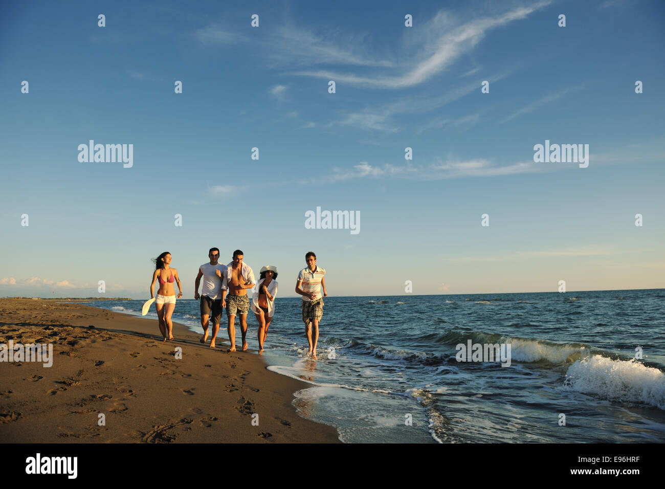 people group running on the beach Stock Photo - Alamy