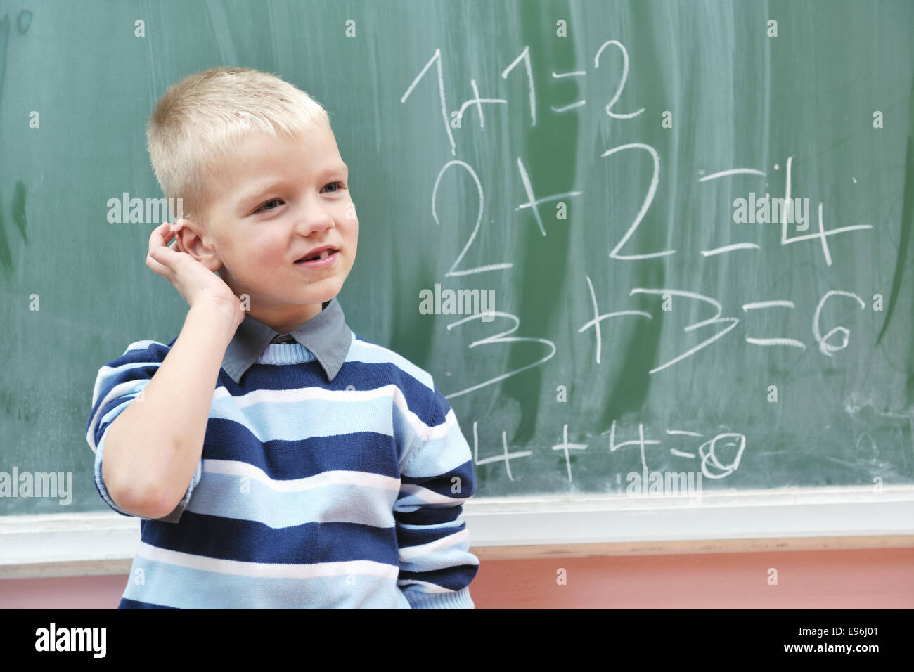 happy young boy at first grade math classes Stock Photo - Alamy
