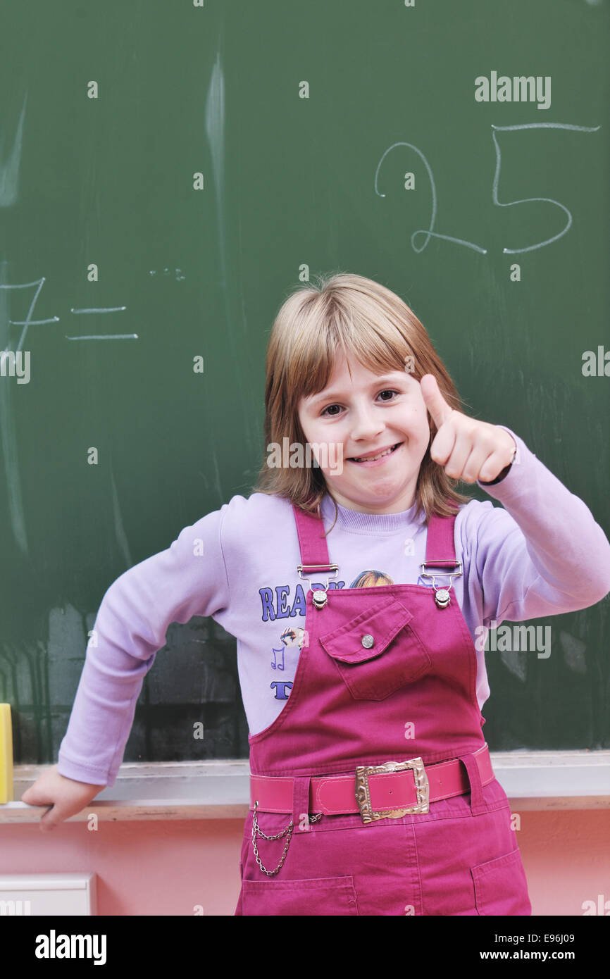 happy school girl on math classes Stock Photo - Alamy