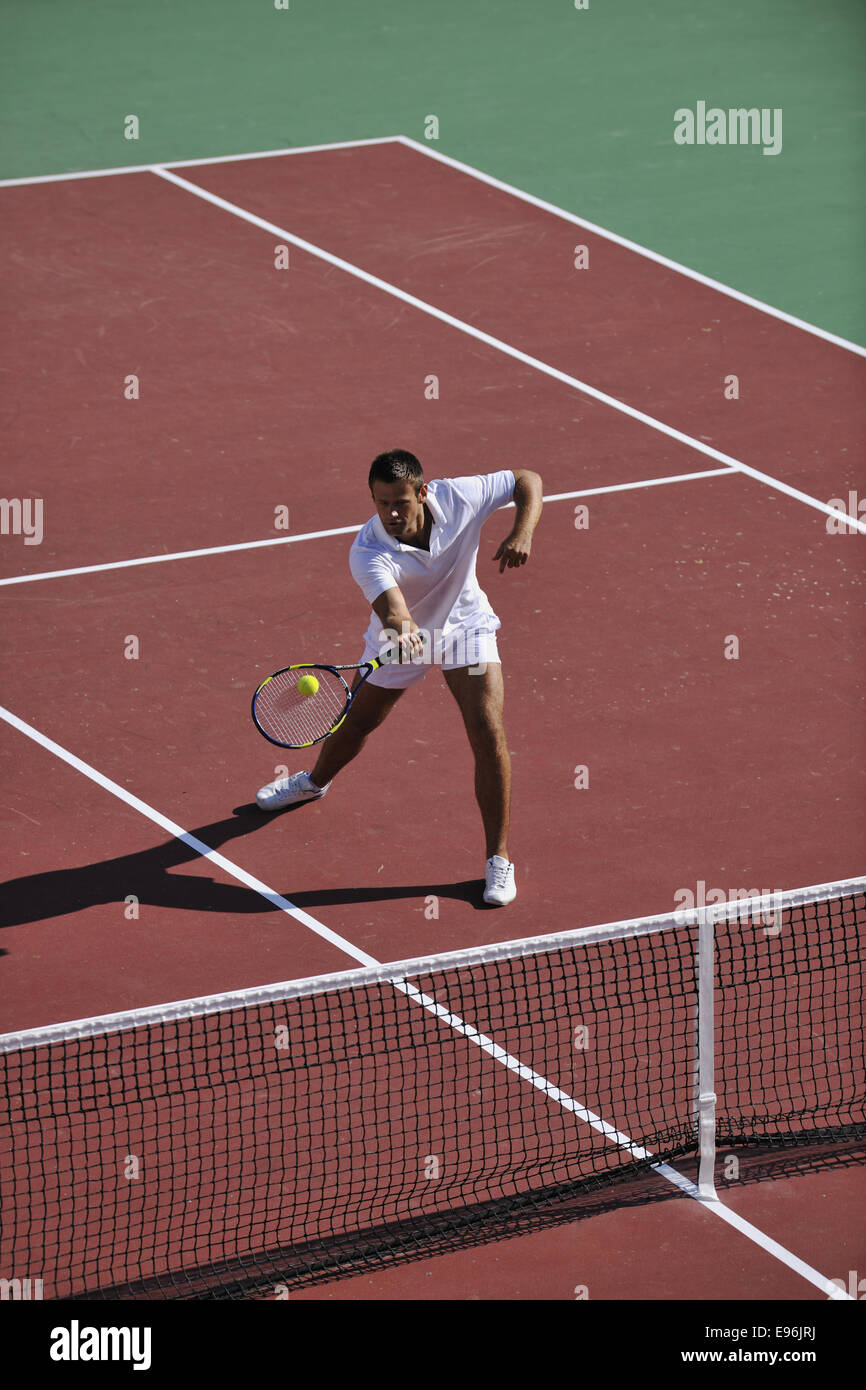 young man play tennis outdoor Stock Photo - Alamy