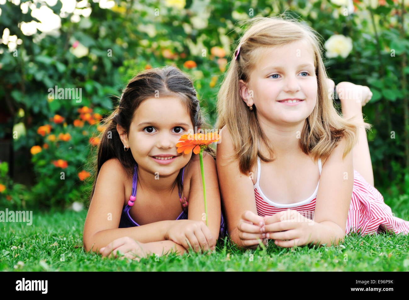 two happy girls have fun outdoor Stock Photo - Alamy
