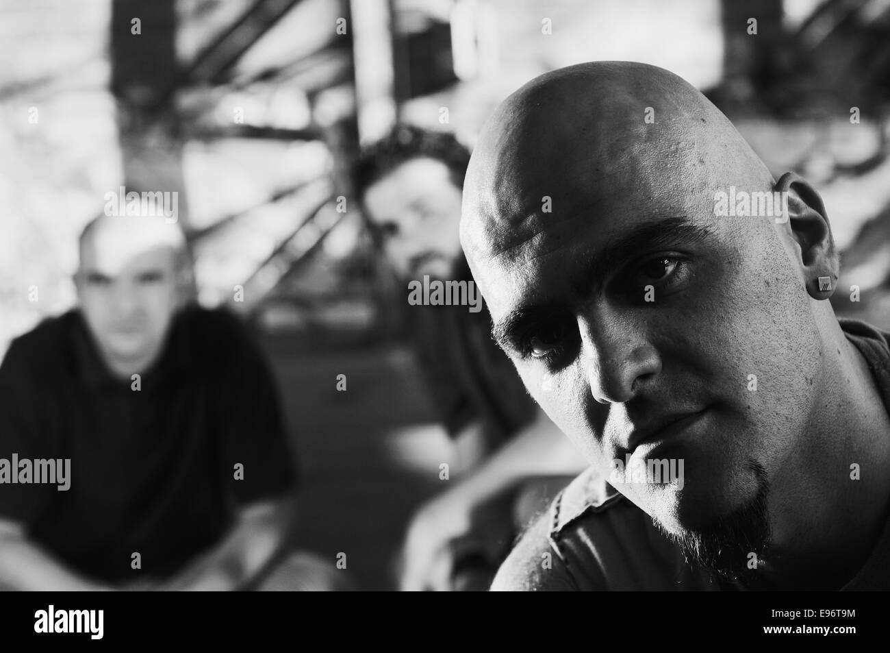 three man group Stock Photo - Alamy