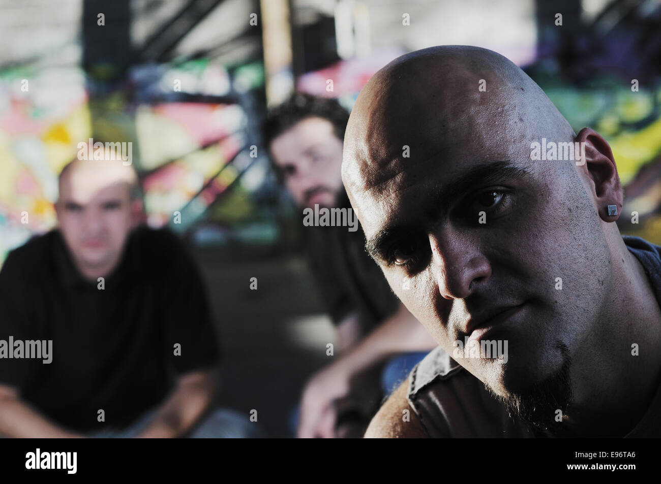 three man group Stock Photo - Alamy