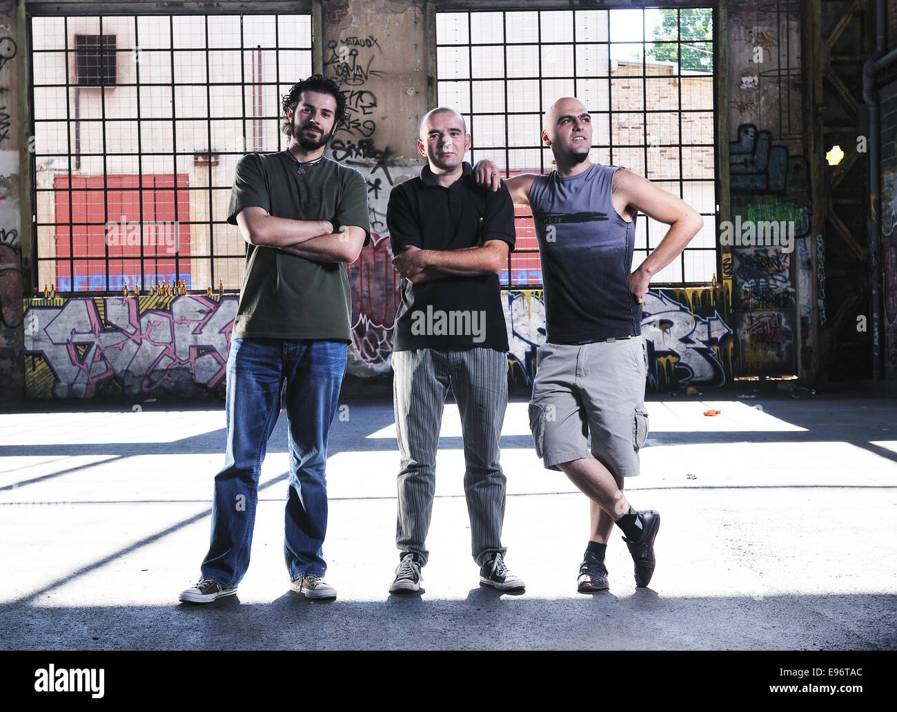 three man group Stock Photo - Alamy