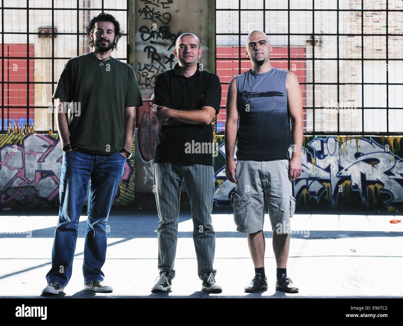 three man group Stock Photo - Alamy