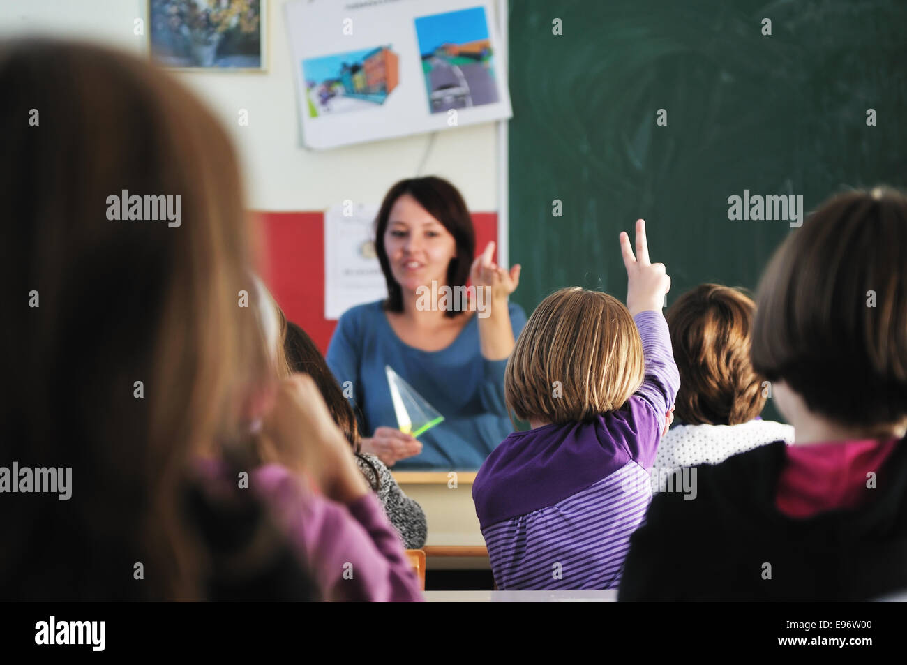 happy teacher in school classroom Stock Photo - Alamy