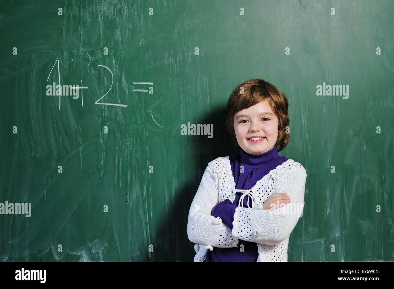 happy school girl on math classes Stock Photo - Alamy