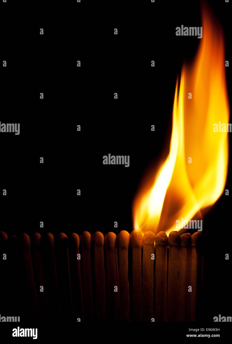 burning matchsticks on black background Stock Photo - Alamy