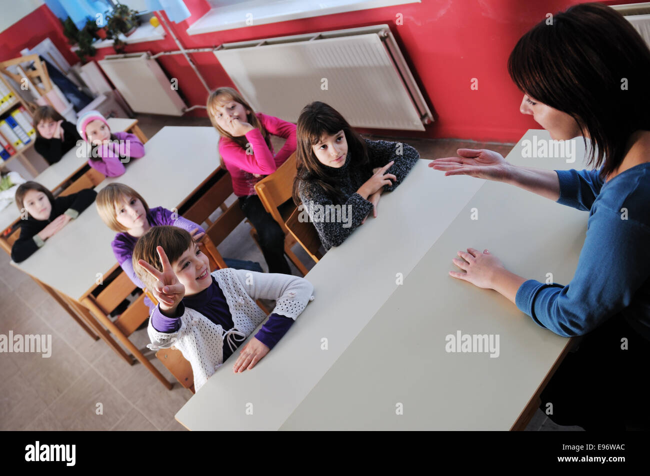 happy teacher in school classroom Stock Photo - Alamy