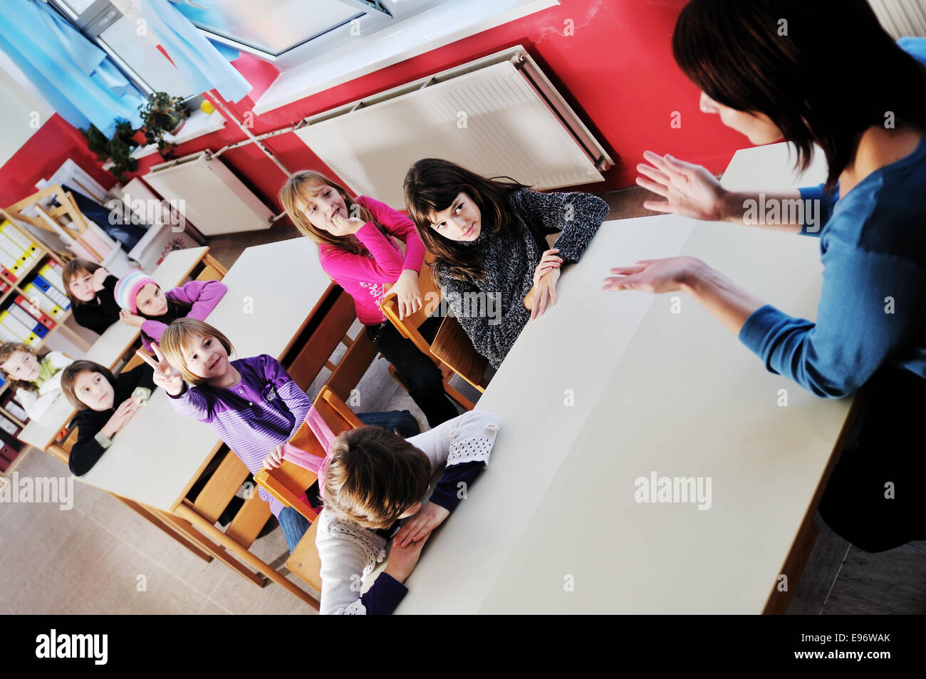 happy teacher in school classroom Stock Photo - Alamy