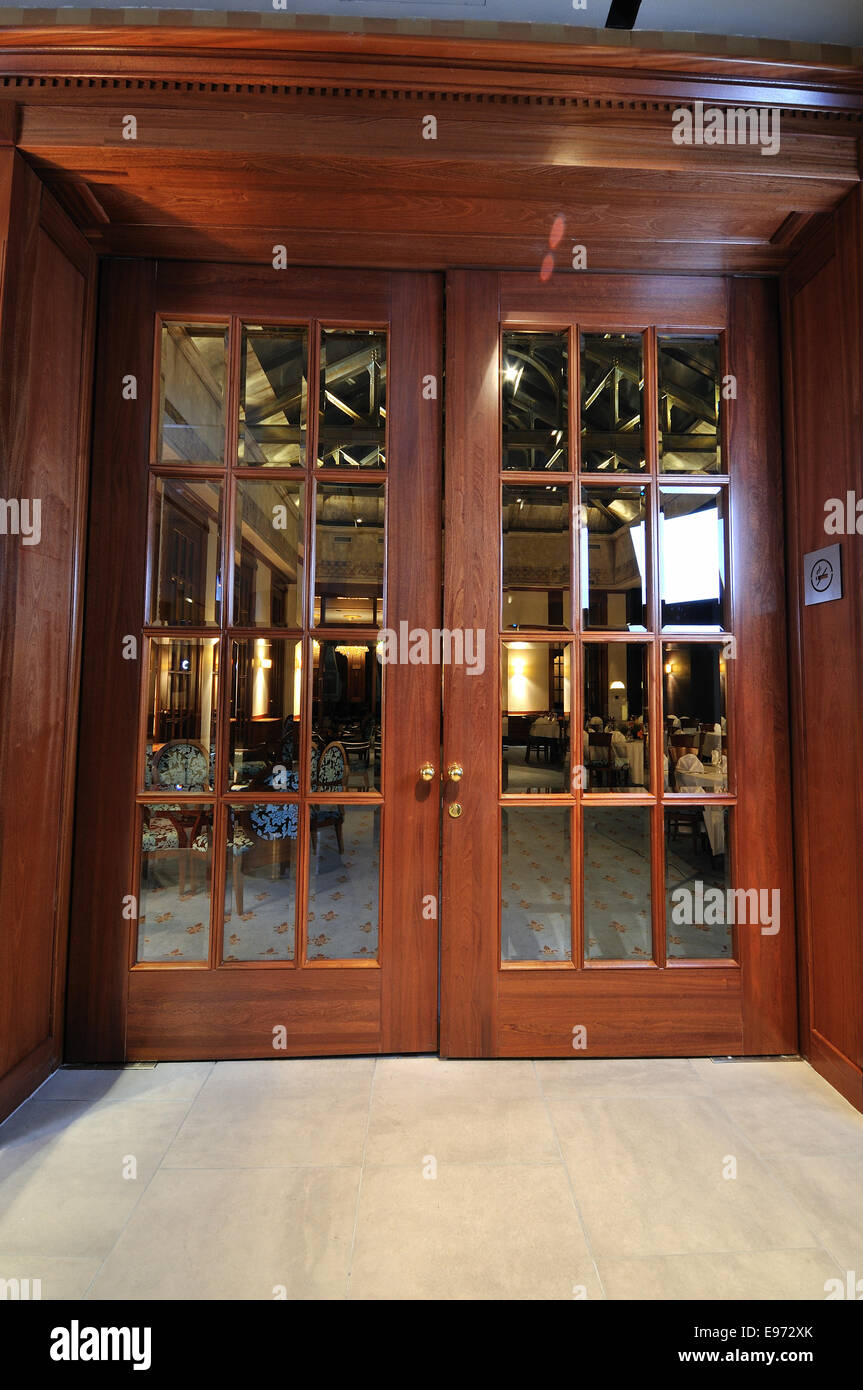 Big wooden door in restaurant hi-res stock photography and images - Alamy