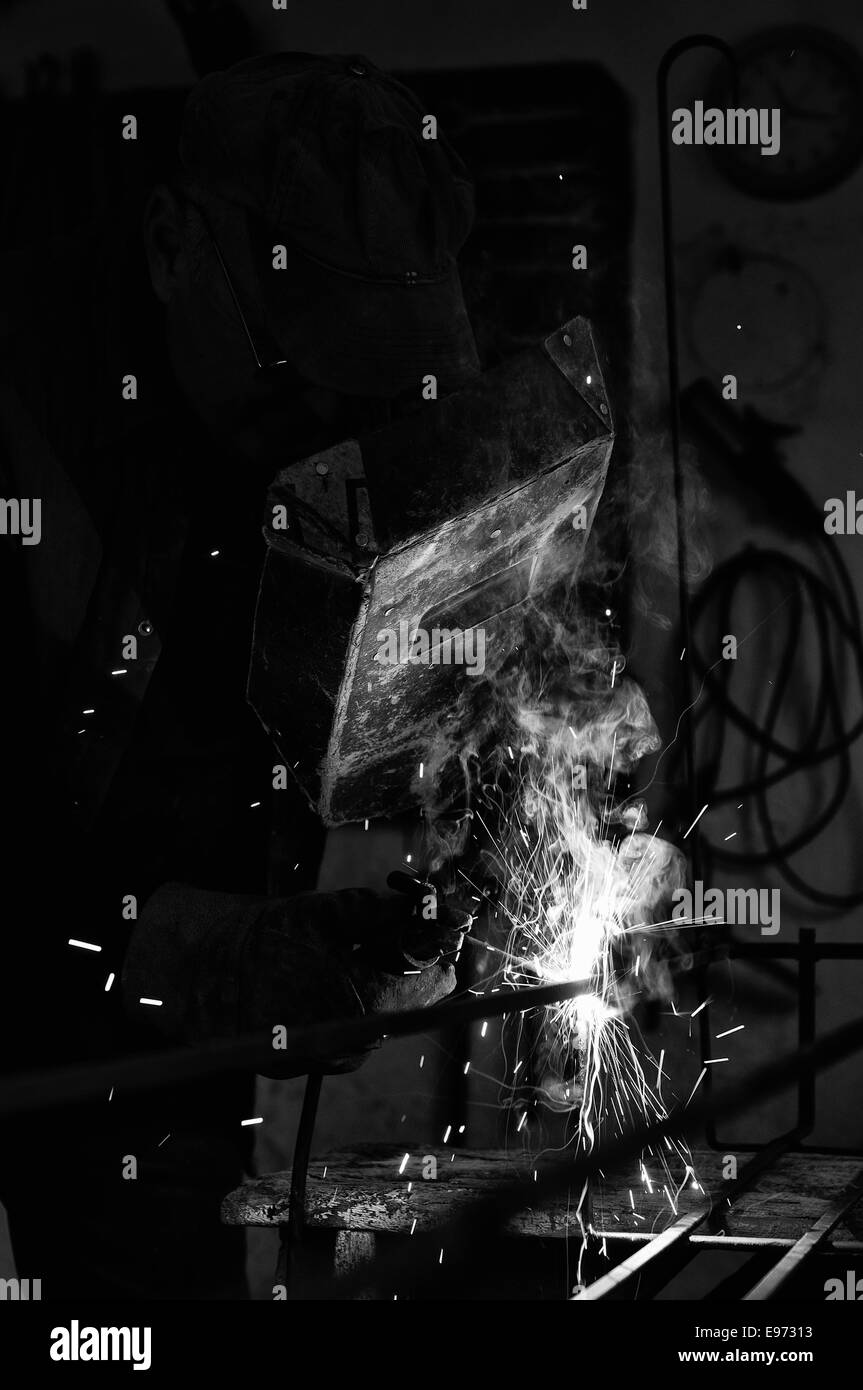 Industrial arc welder working Black and White Stock Photos & Images - Alamy