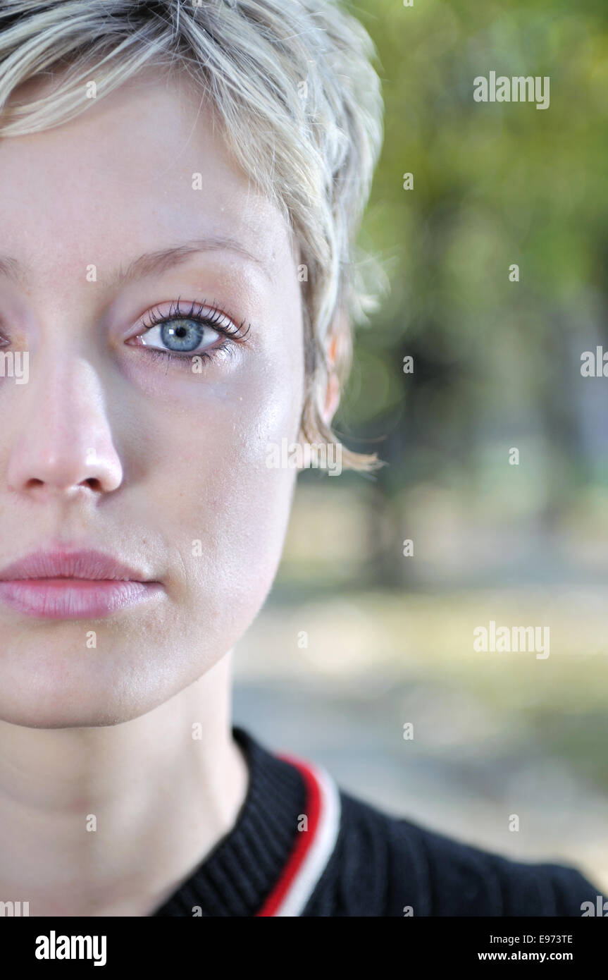 Young woman looking Stock Photo - Alamy