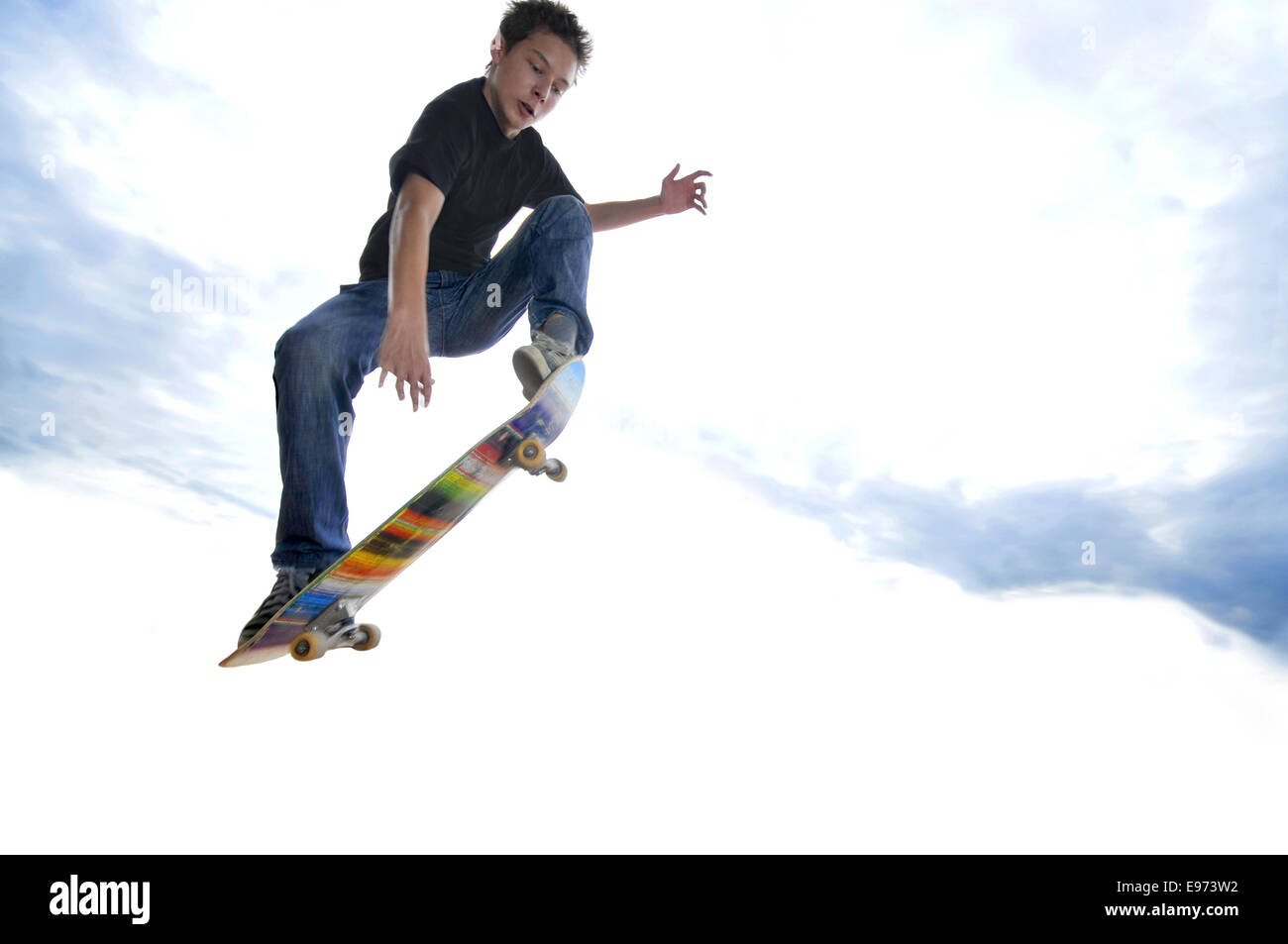 Boy practicing skate in a skate park Stock Photo - Alamy