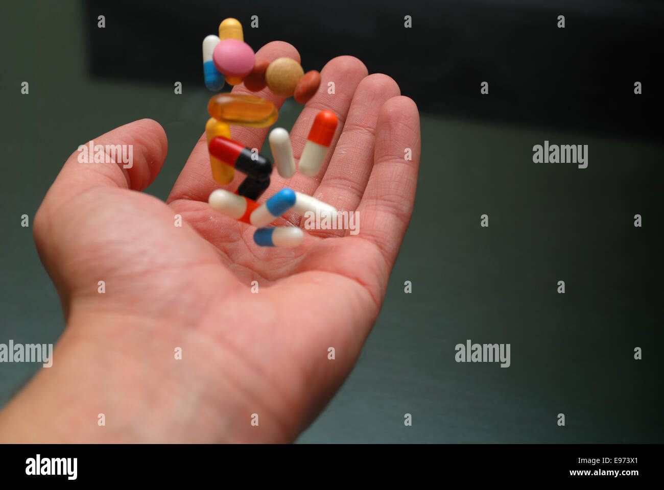 pills in hand Stock Photo - Alamy