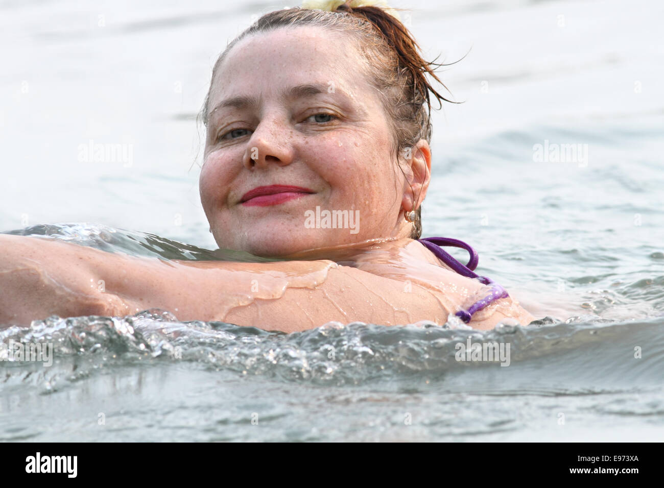 Woman is floating Stock Photo - Alamy