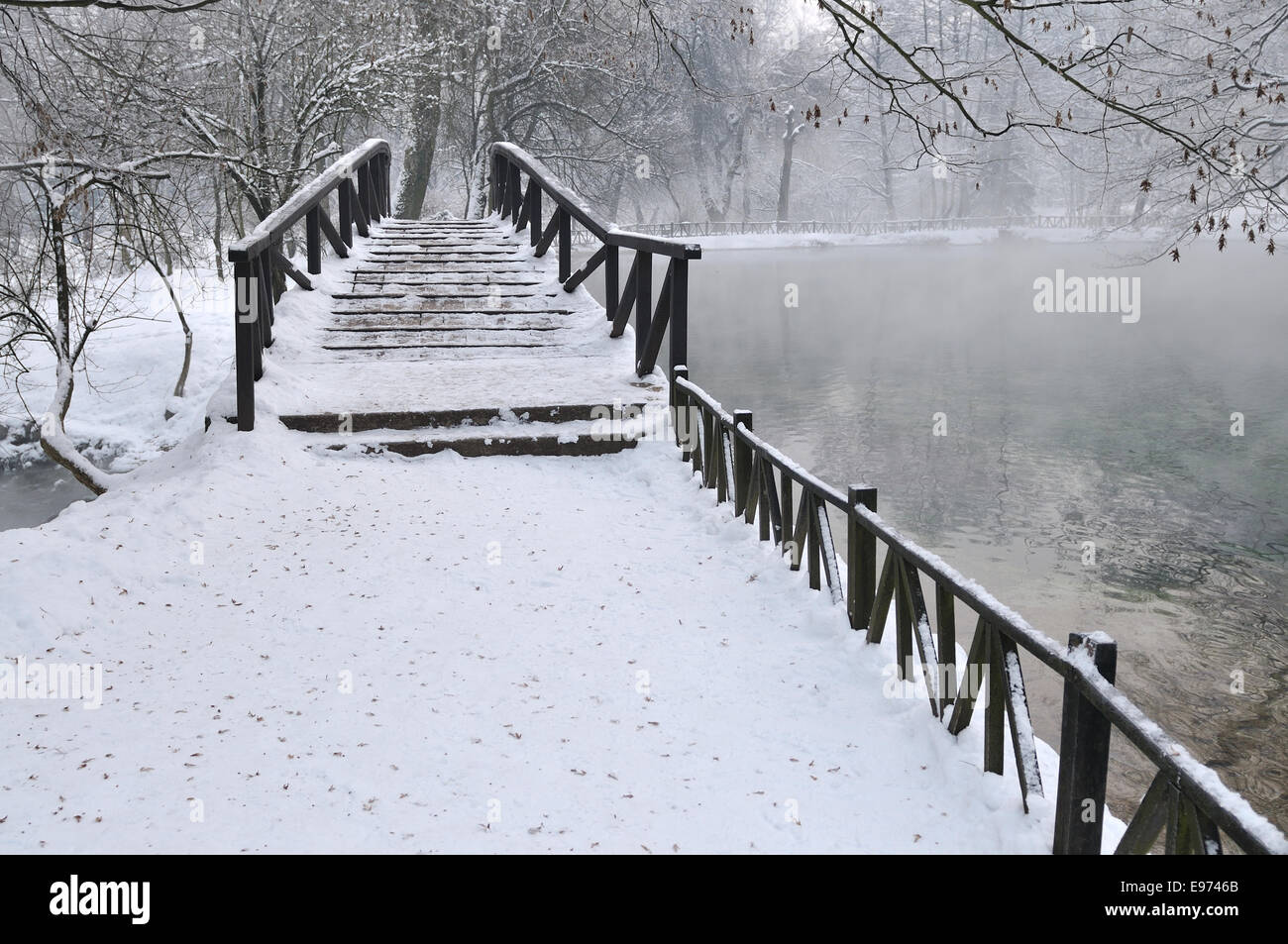 small wooden bridge at winter Stock Photo - Alamy