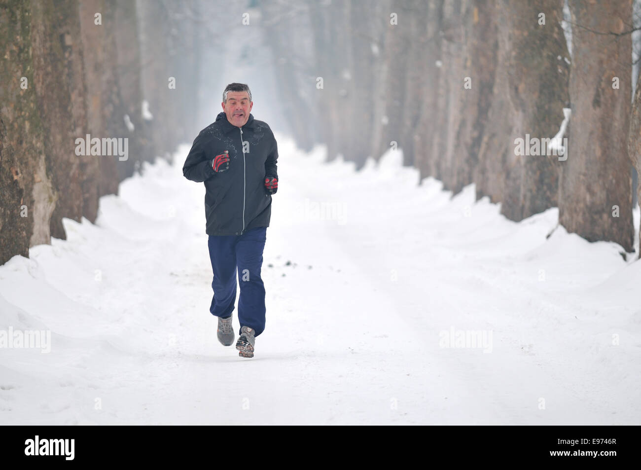 one older man running at alley Stock Photo - Alamy