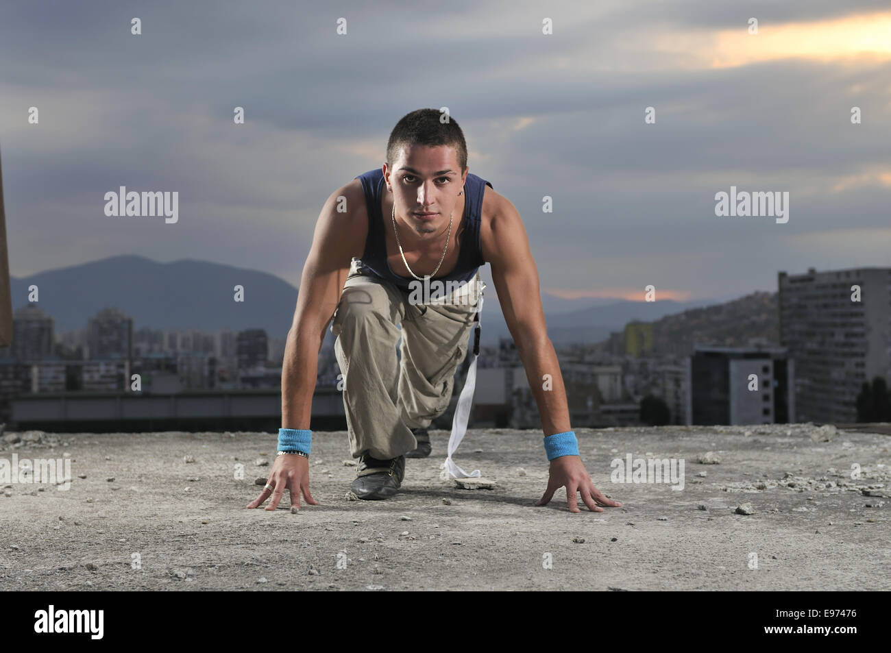 man on the start position ready to run Stock Photo - Alamy