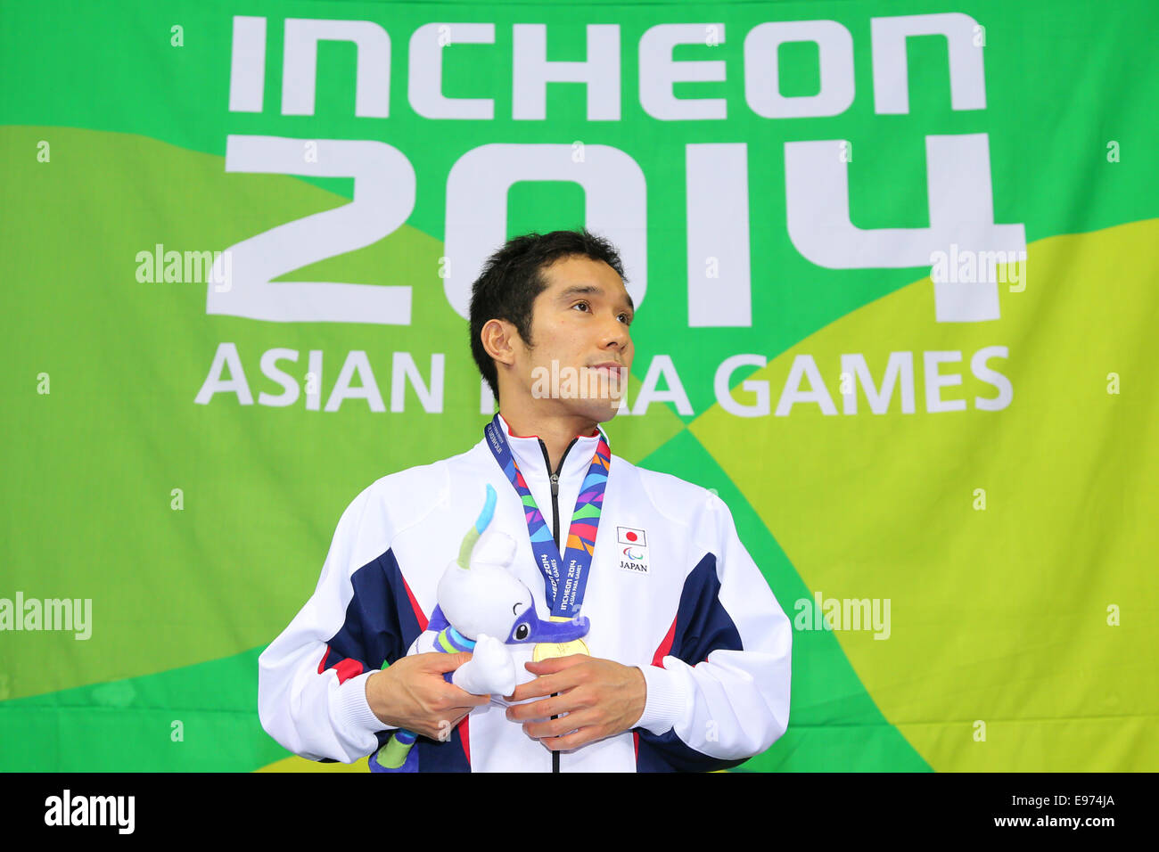 Incheon, South Korea. 20th Oct, 2014. Yasuhiro Tanaka (JPN) Swimming : Men's 100m Breaststroke ...
