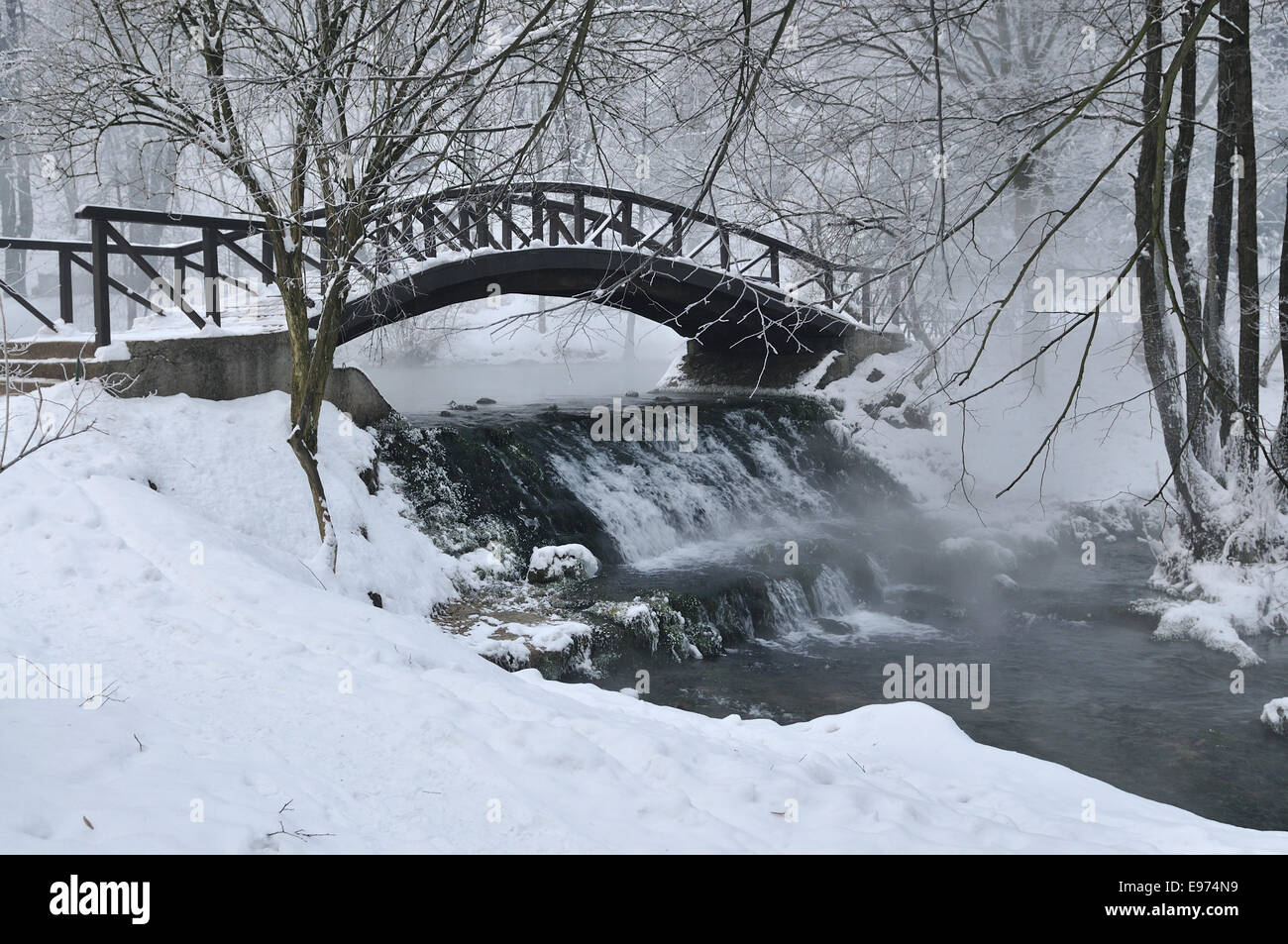 small wooden bridge at winter Stock Photo - Alamy