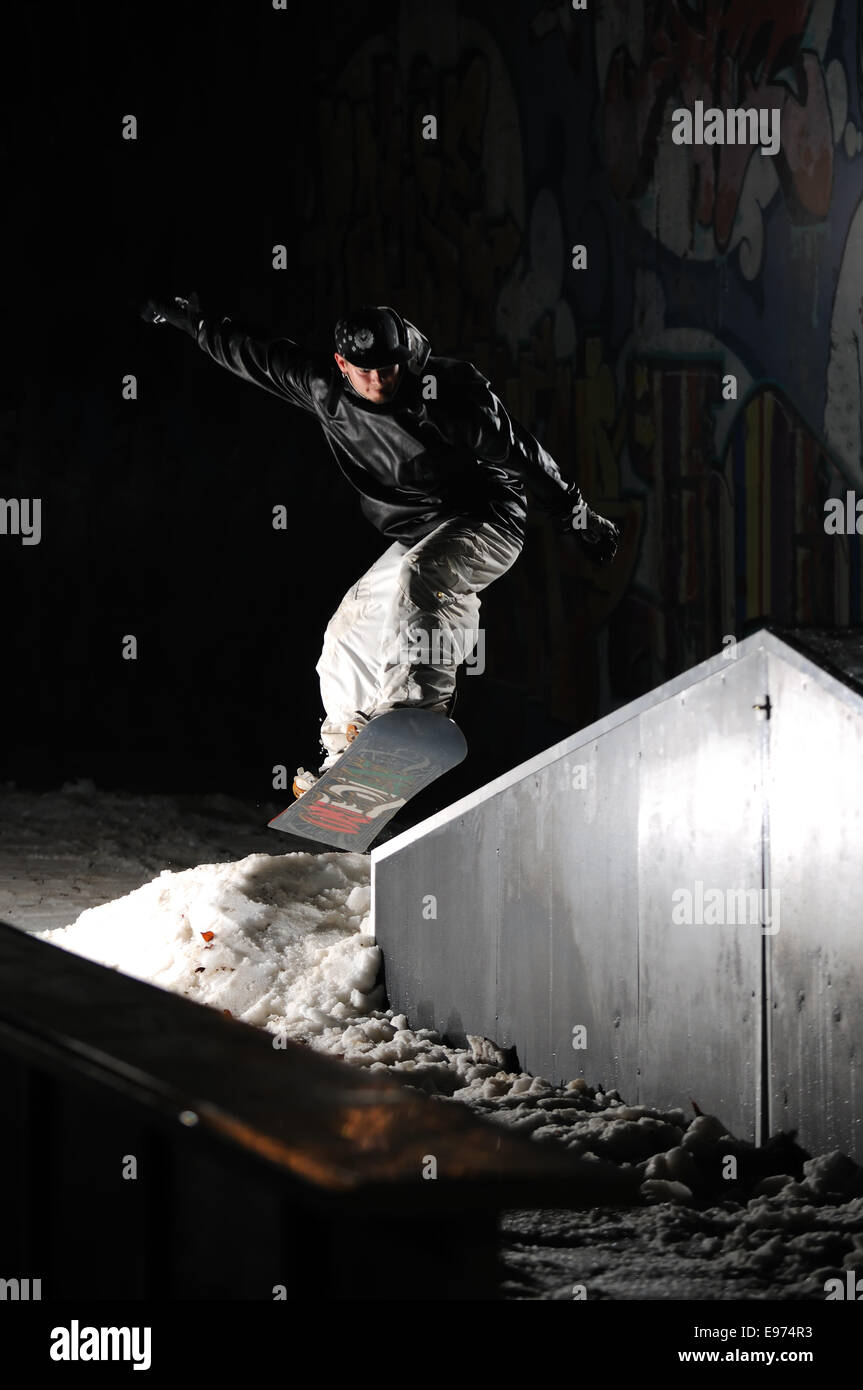 freestyle snowboarder jump in air at night Stock Photo - Alamy