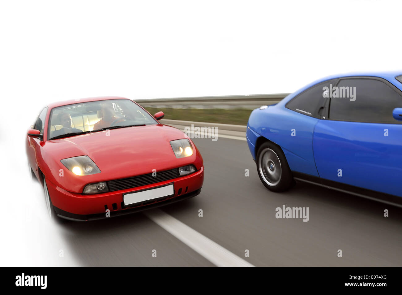 Isolated tuning cars racing on highway Stock Photo - Alamy