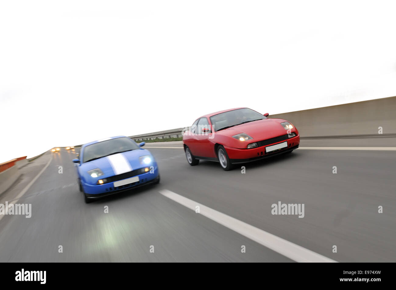 Isolated tuning cars racing on highway Stock Photo - Alamy
