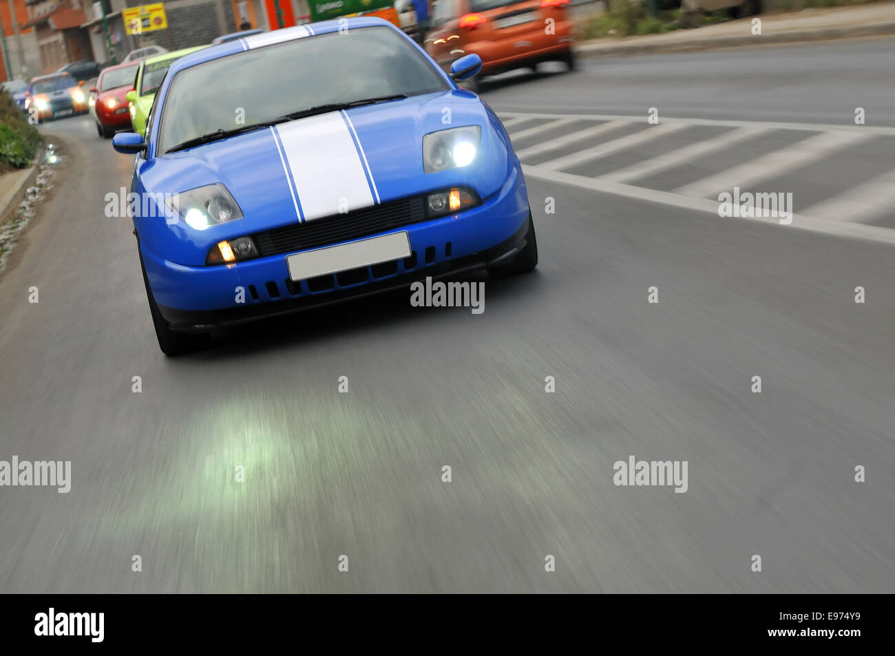 Blue sports car with white stripe hi-res stock photography and images ...