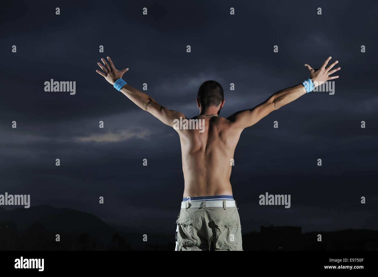 Man with his arms wide open Stock Photo - Alamy