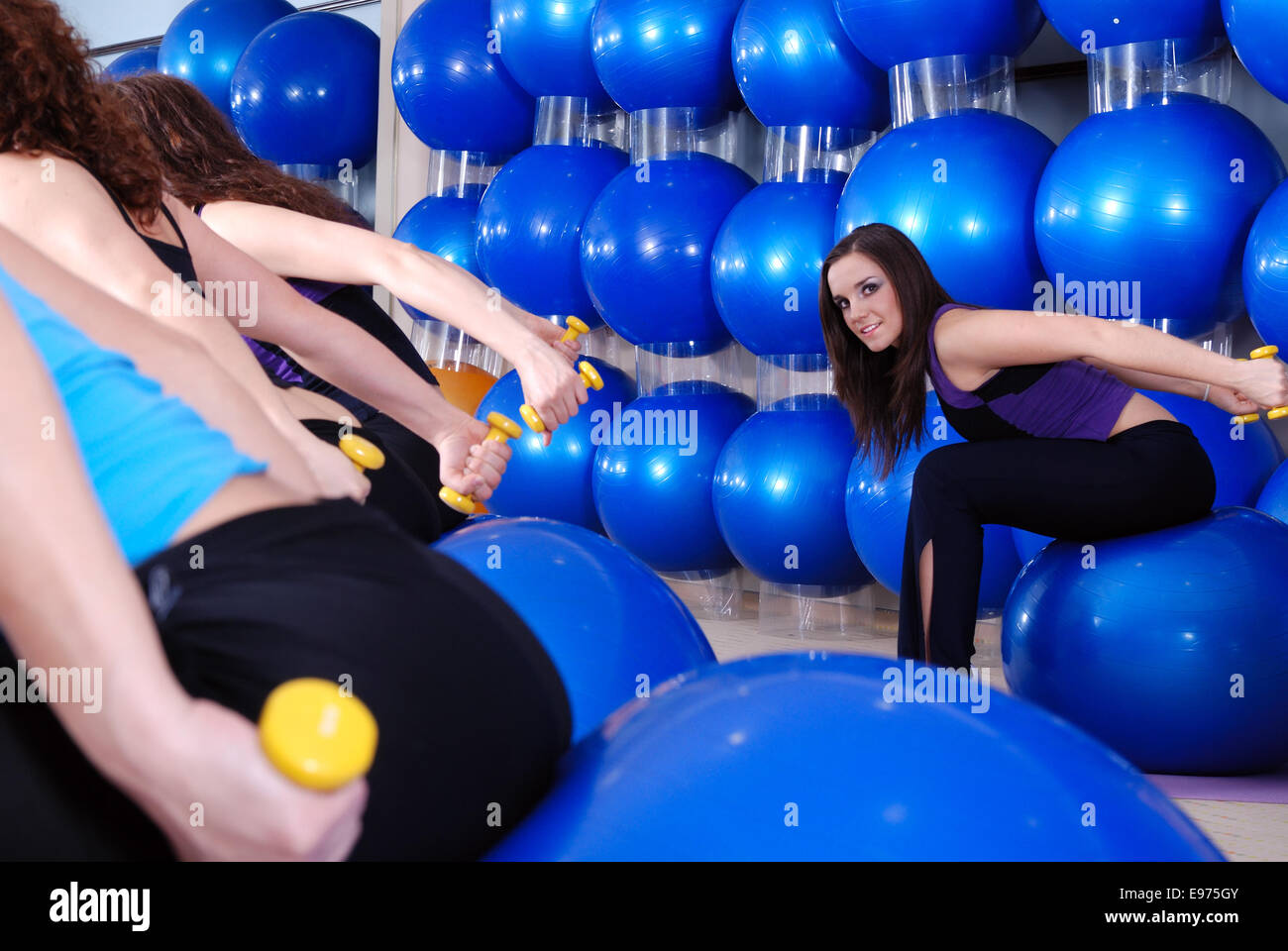 beautiful young girls working out in a gym Stock Photo - Alamy