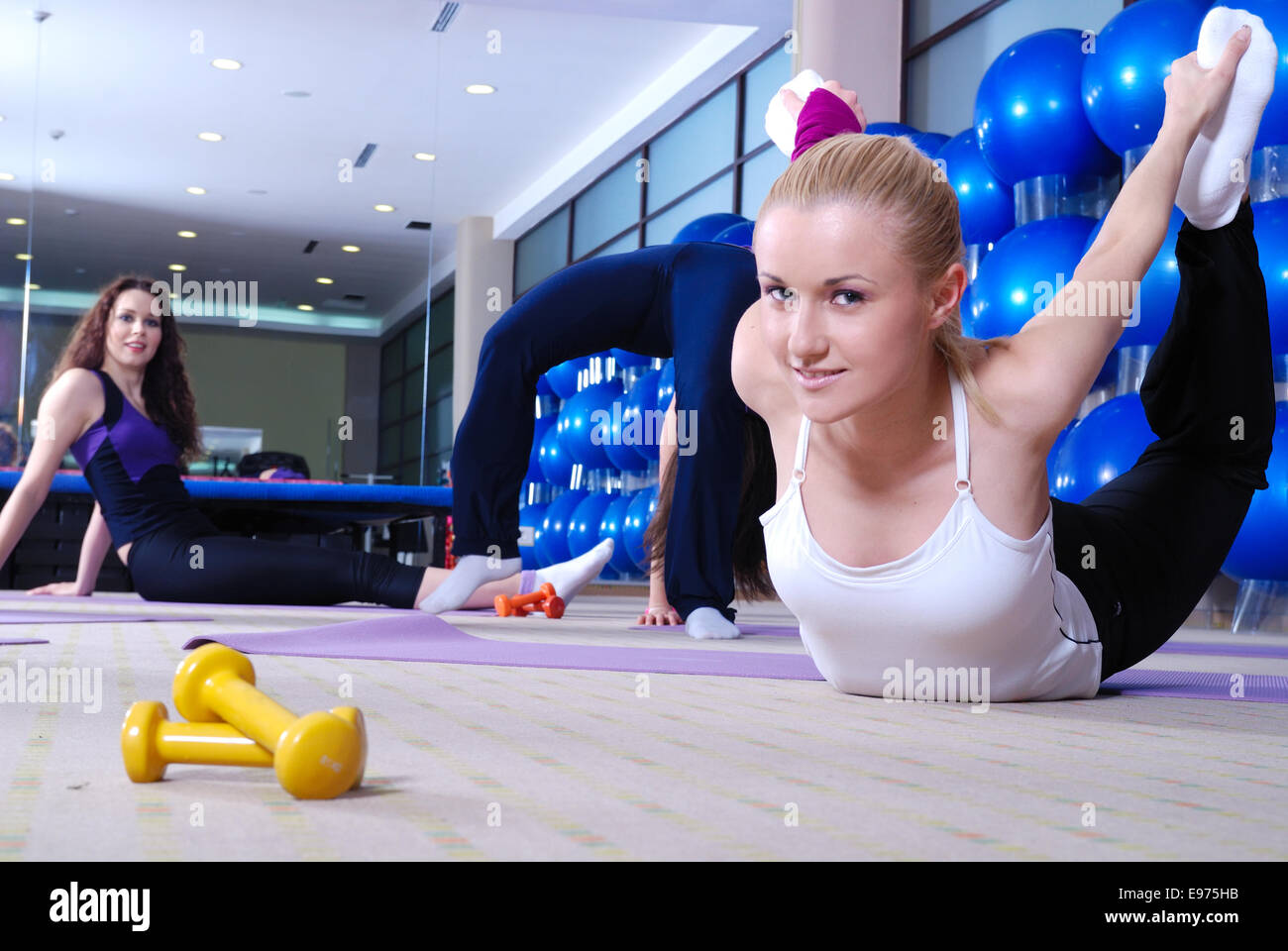 beautiful young girls working out in a gym Stock Photo - Alamy