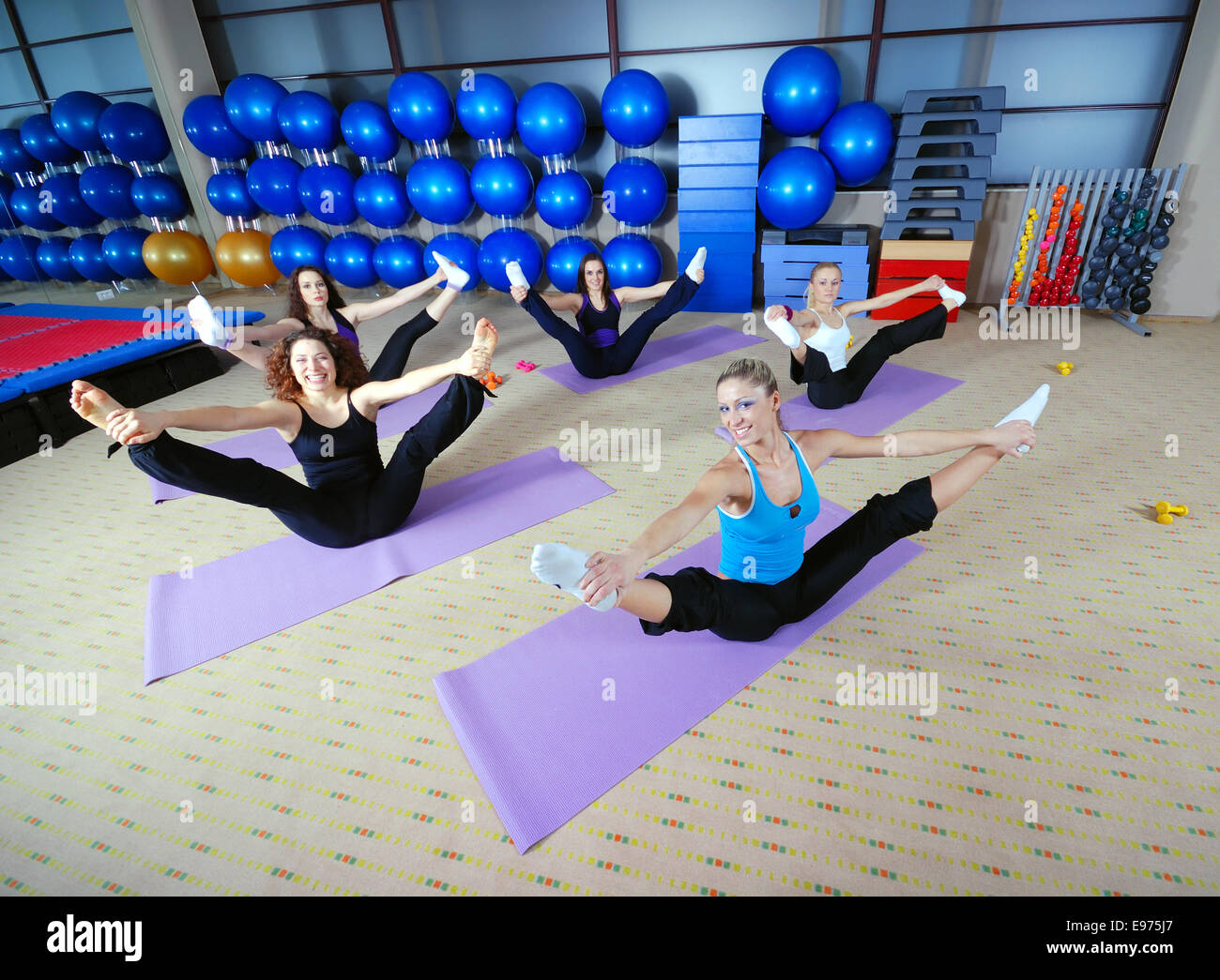 beautiful young girls working out in a gym Stock Photo - Alamy