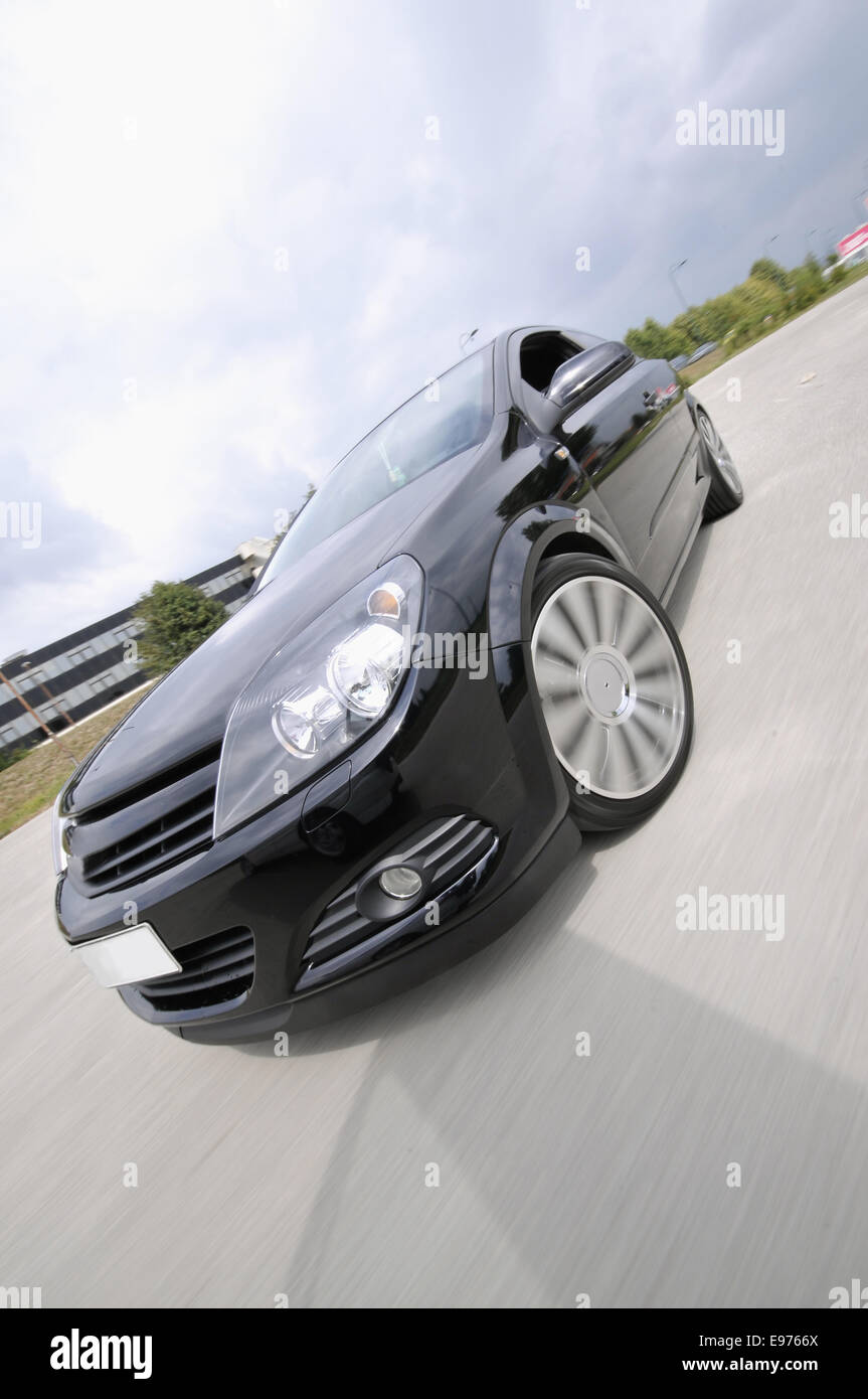Fast car moving with motion blur Stock Photo - Alamy